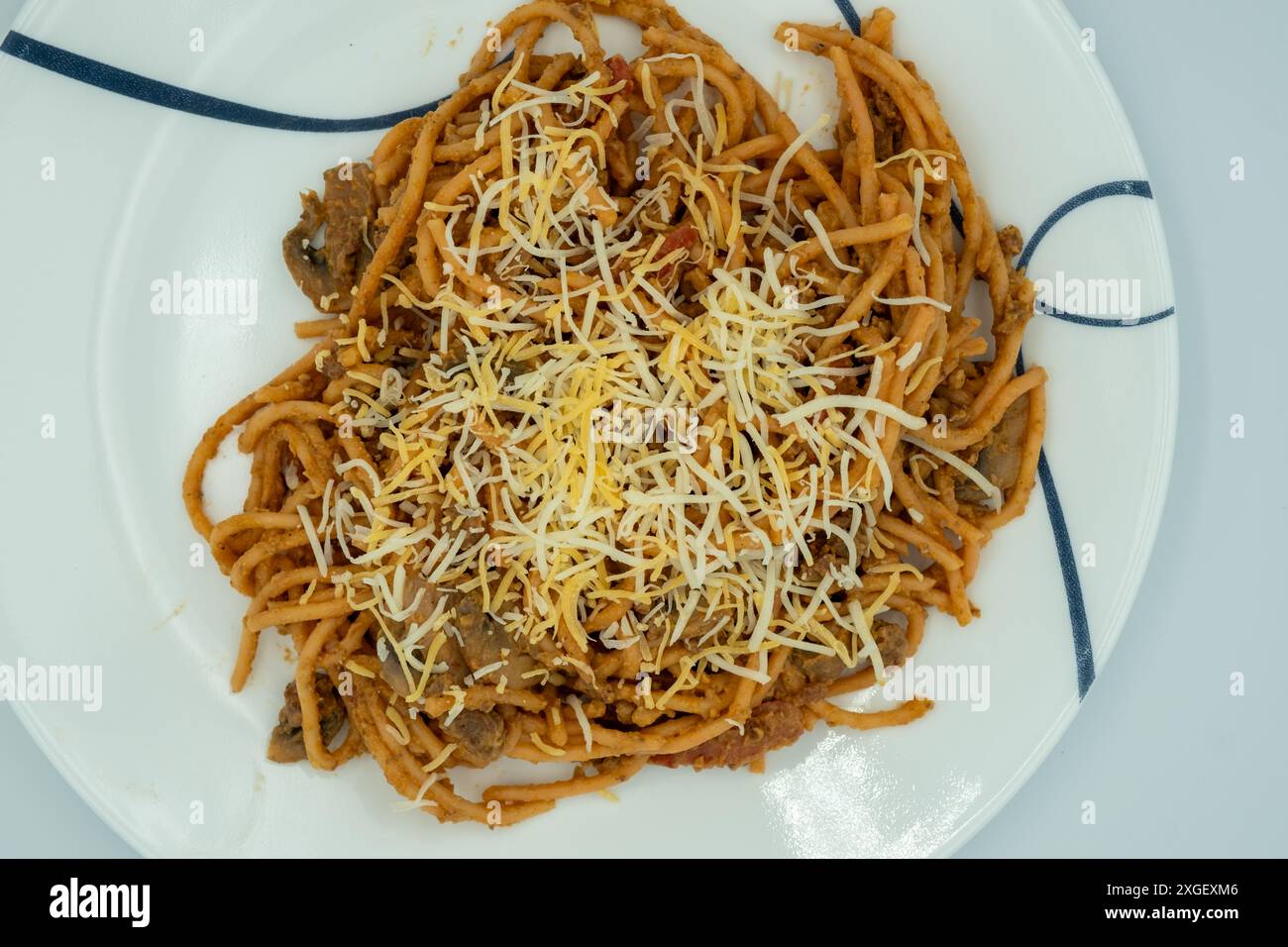 Philippine Sweet Spaghetti with Cheese on top and hotdogs Stock Photo ...
