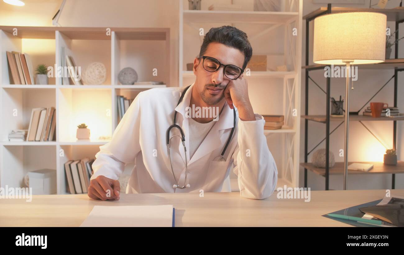 Tired doctor. Clinic overwork. Exhausted medical professional man in ...
