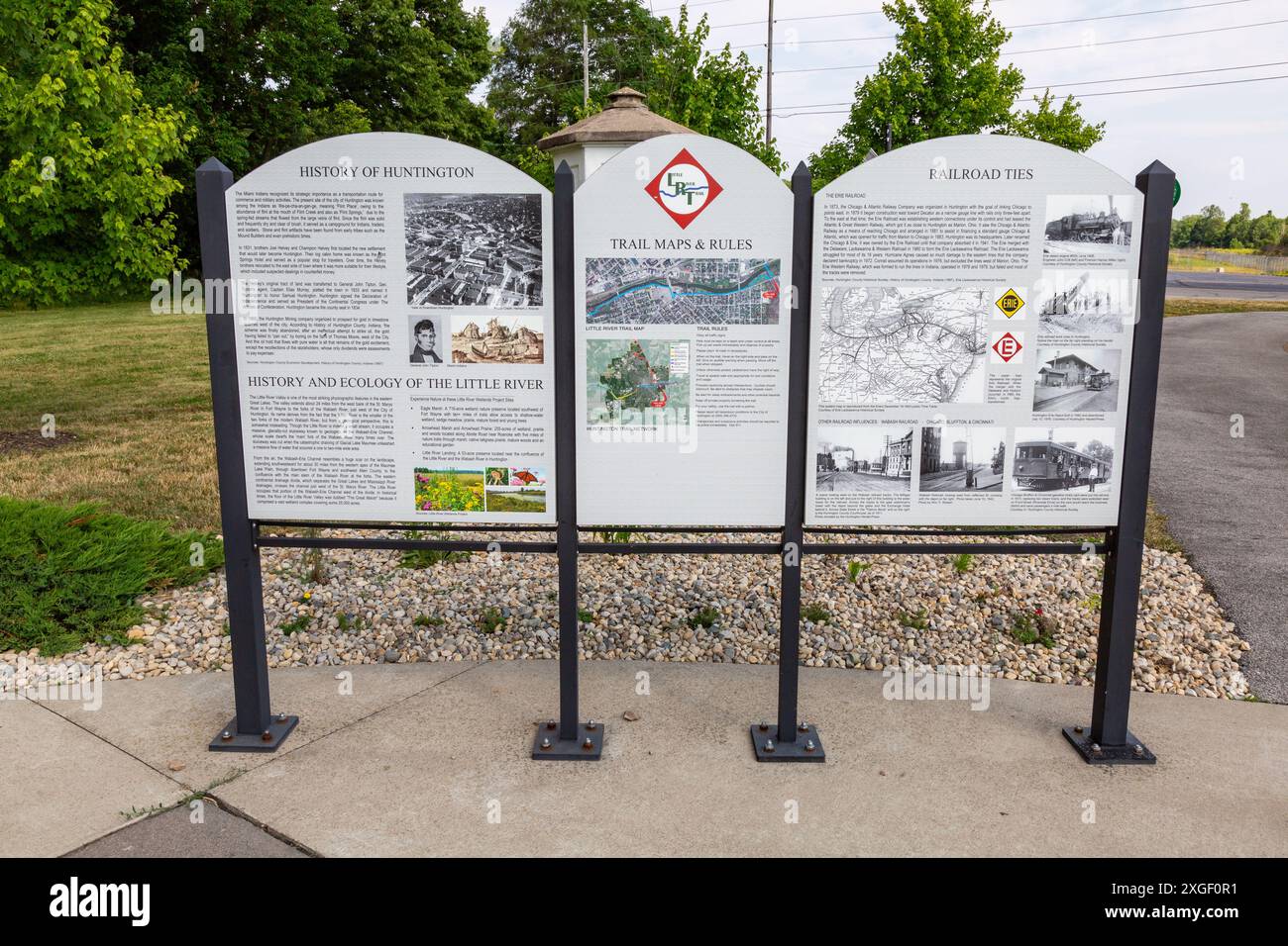 A panel of signs along the Little River Trail provides information at ...
