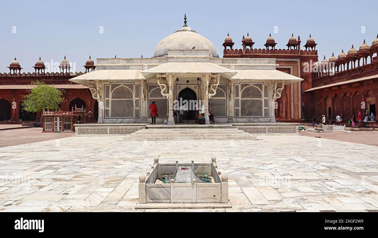 The white ornate marble tomb is the burial place of Sufi Saint Salim ...