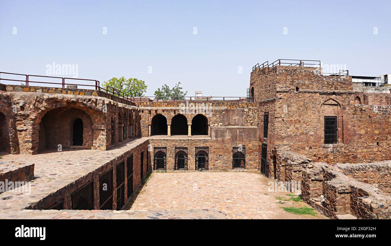 The ruined view of Firoz Shah Palace Complex, built by Firoz Shah Tughlaq in the 14th century ...