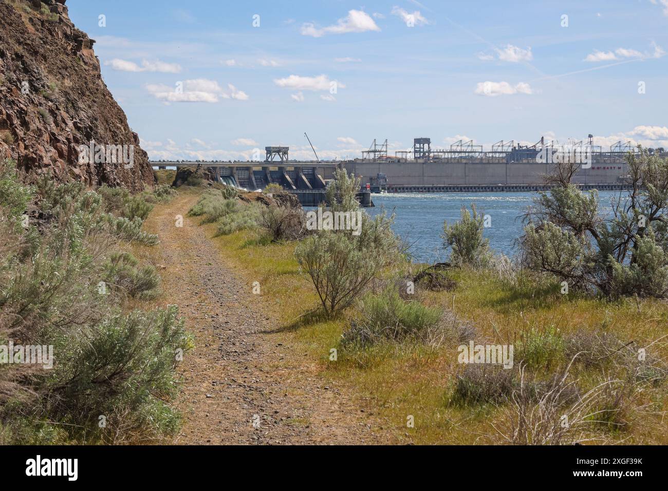 McNary Dam lies in the distance from the former railroad bed that ...