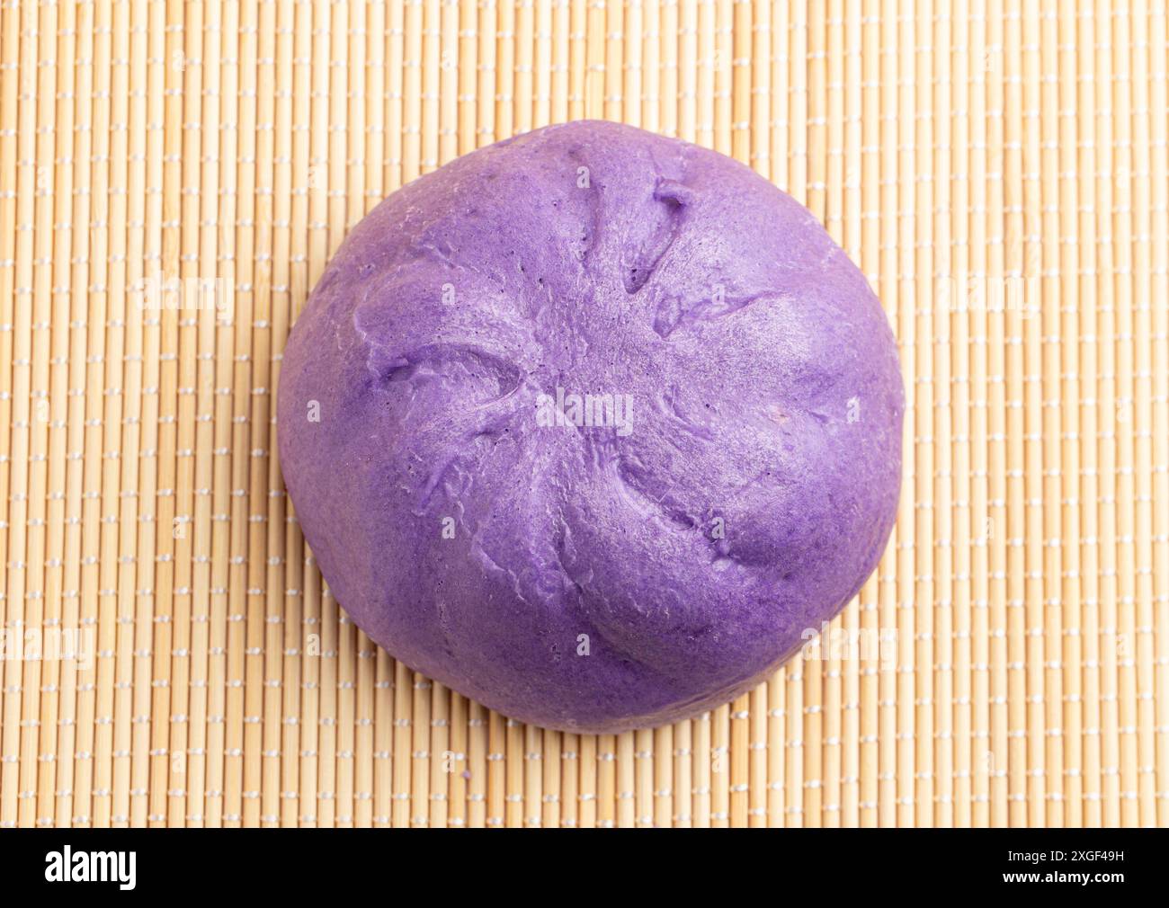 Steamed Purple Ube Sweet Potato Dumplings Stock Photo - Alamy