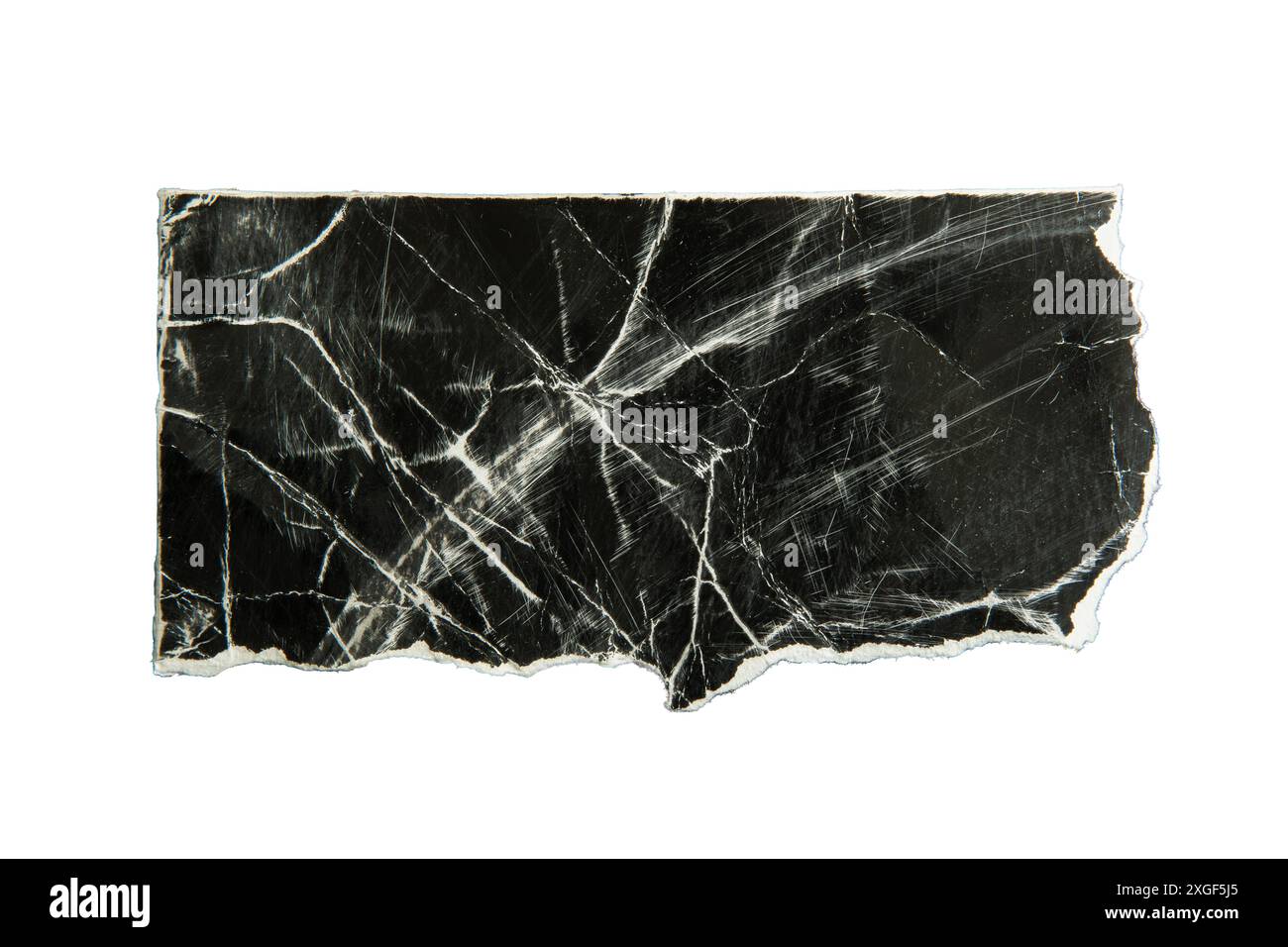 Torn distressed black paper on white background with clipping path ...