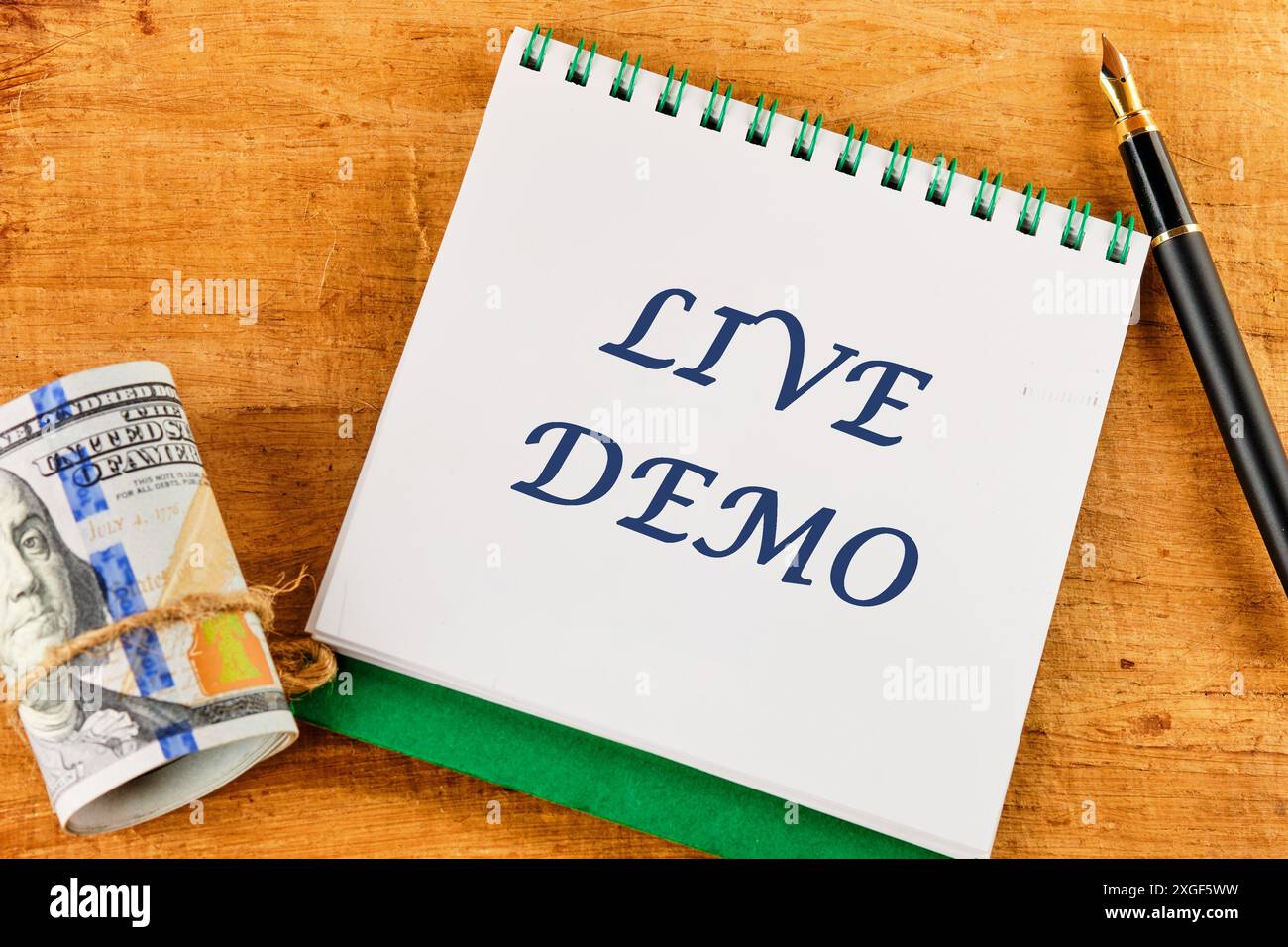 Business and Live Demo concept. Copy space. Concept word Live Demo on a blank sheet of notepad ...