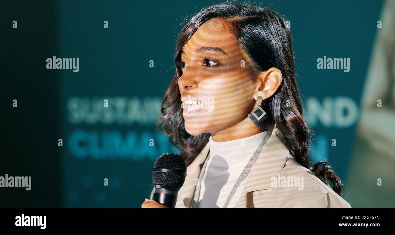 Conference, woman and discussion on stage for speech, talk or speaker ...