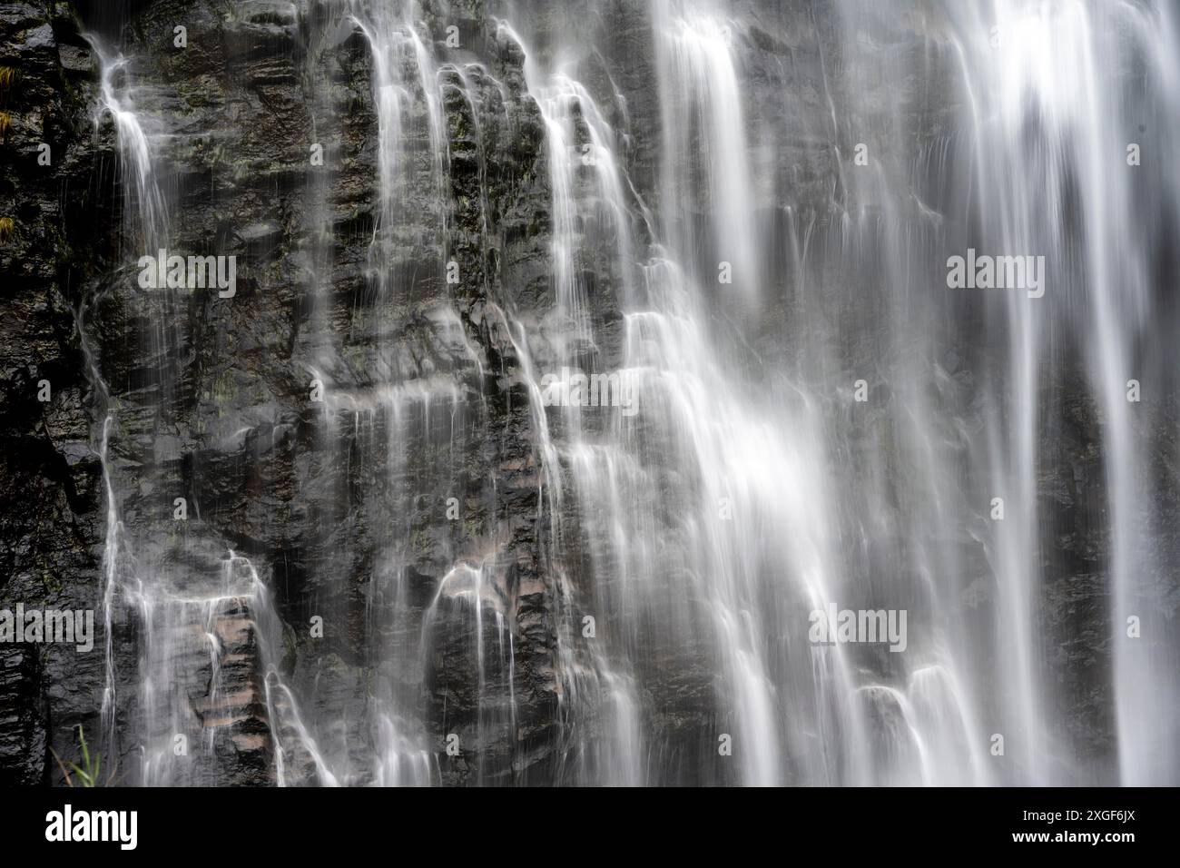 Water flowing down rocks, detail of a waterfall, Lisbon Falls, long ...