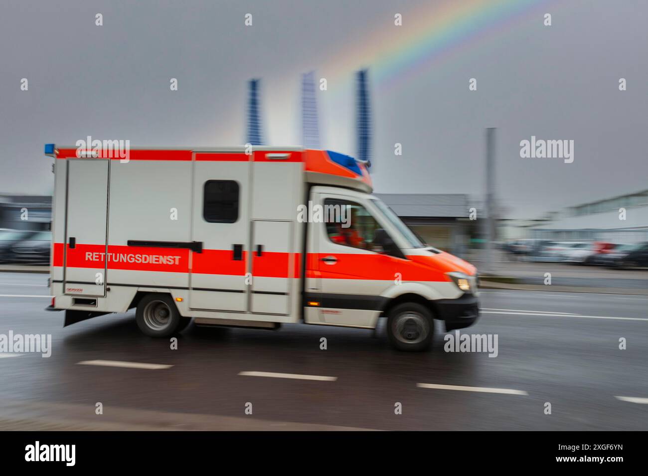 Ambulance of the rescue service on the move Stock Photo - Alamy