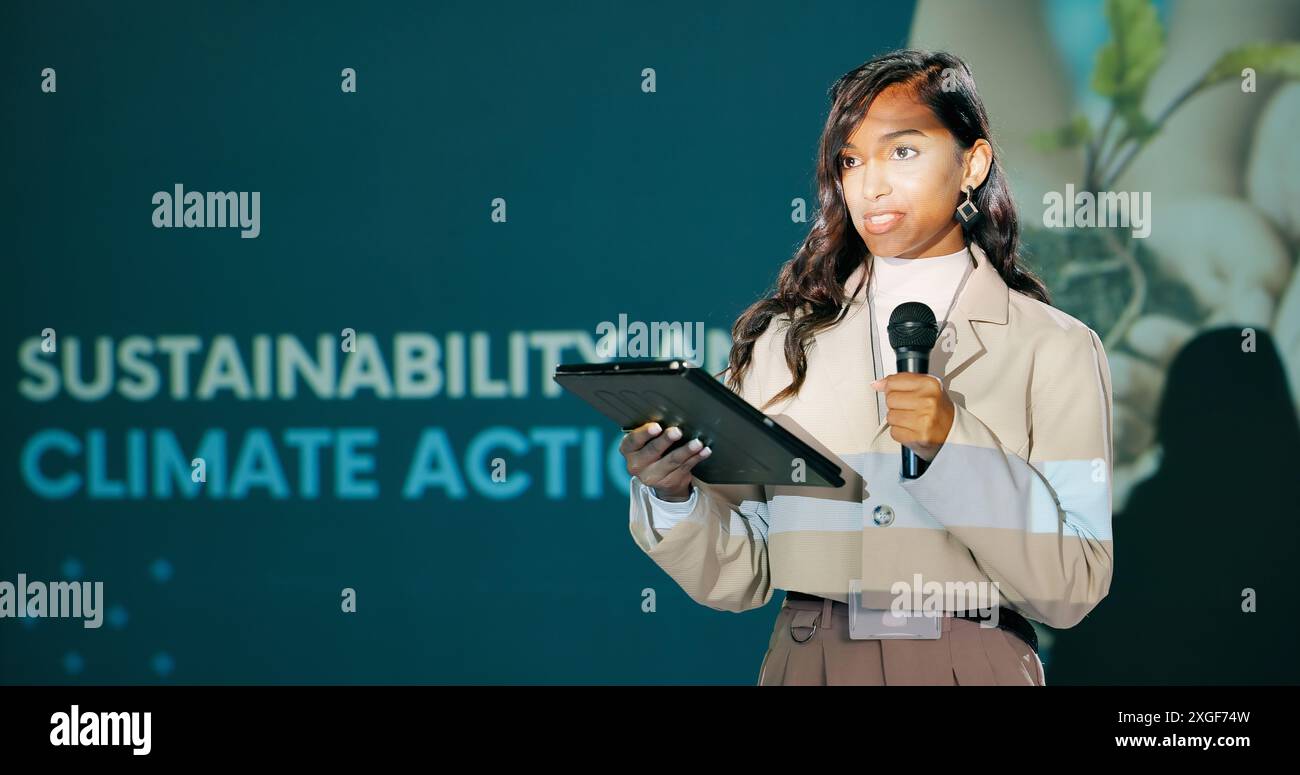 Speech, business woman and tablet with microphone for climate change ...