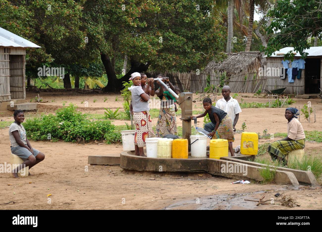 Clean water pump, Licaca, Inhambane, Mozambique. A group of young wome ...