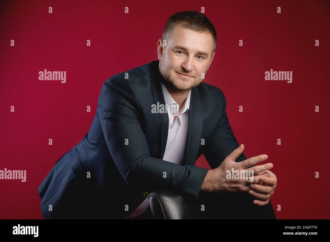 Happy divorced man touching the ring on the ring finger of his right ...