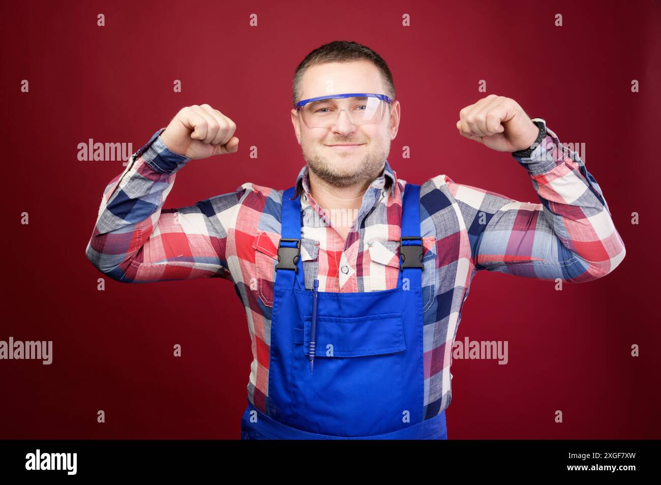 Portrait of a positive friendly Caucasian male foreman repairman in ...