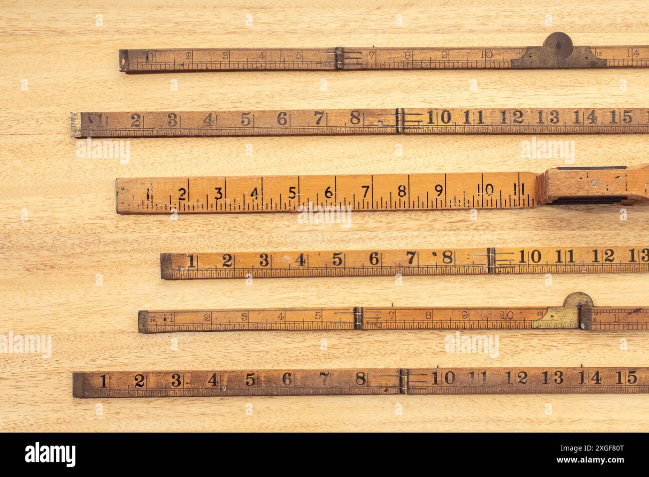 Group of Old wooden ruler on table. Measuring or accuracy concept. Top ...