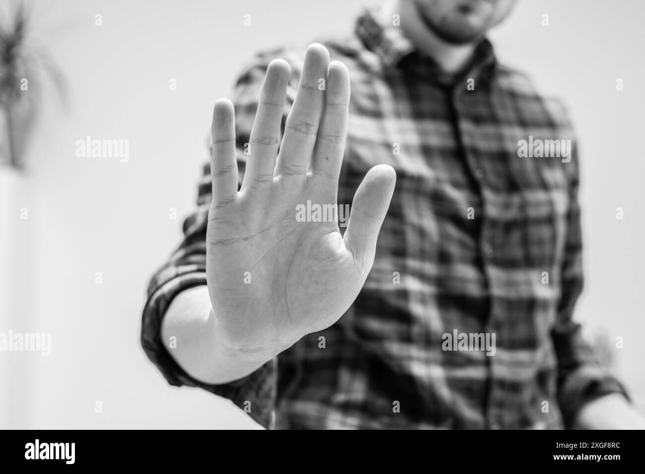 Stop sign with hand up Black and White Stock Photos & Images - Alamy