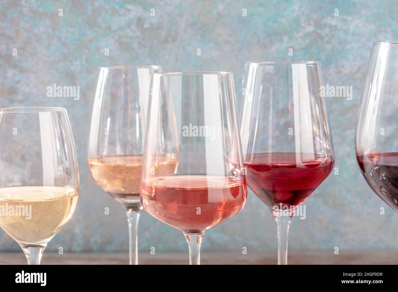 Wine colors. Many glasses of wine, side view Stock Photo - Alamy