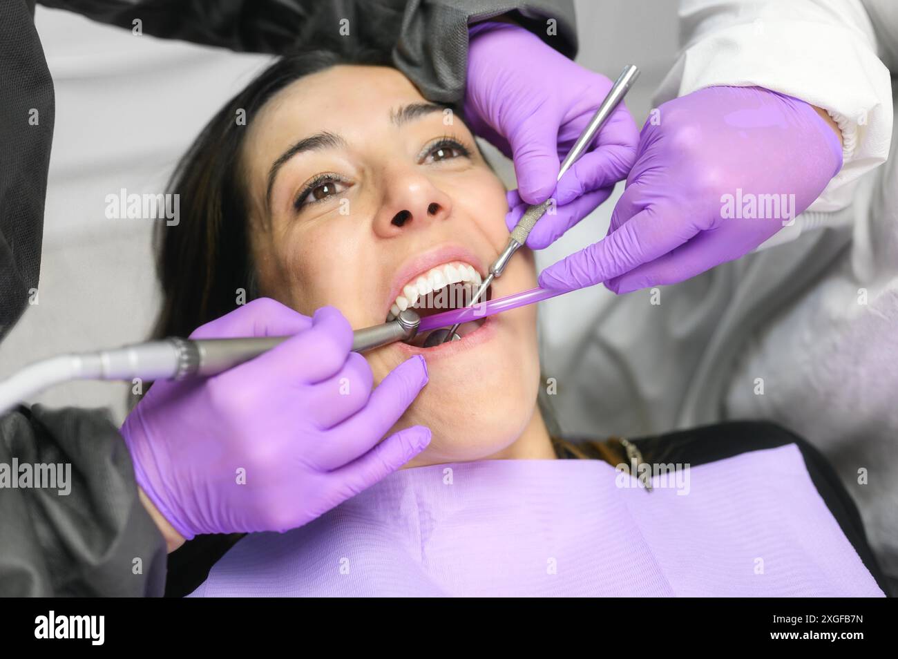 Young woman visit dentistry clinic for professional teeth treatment ...