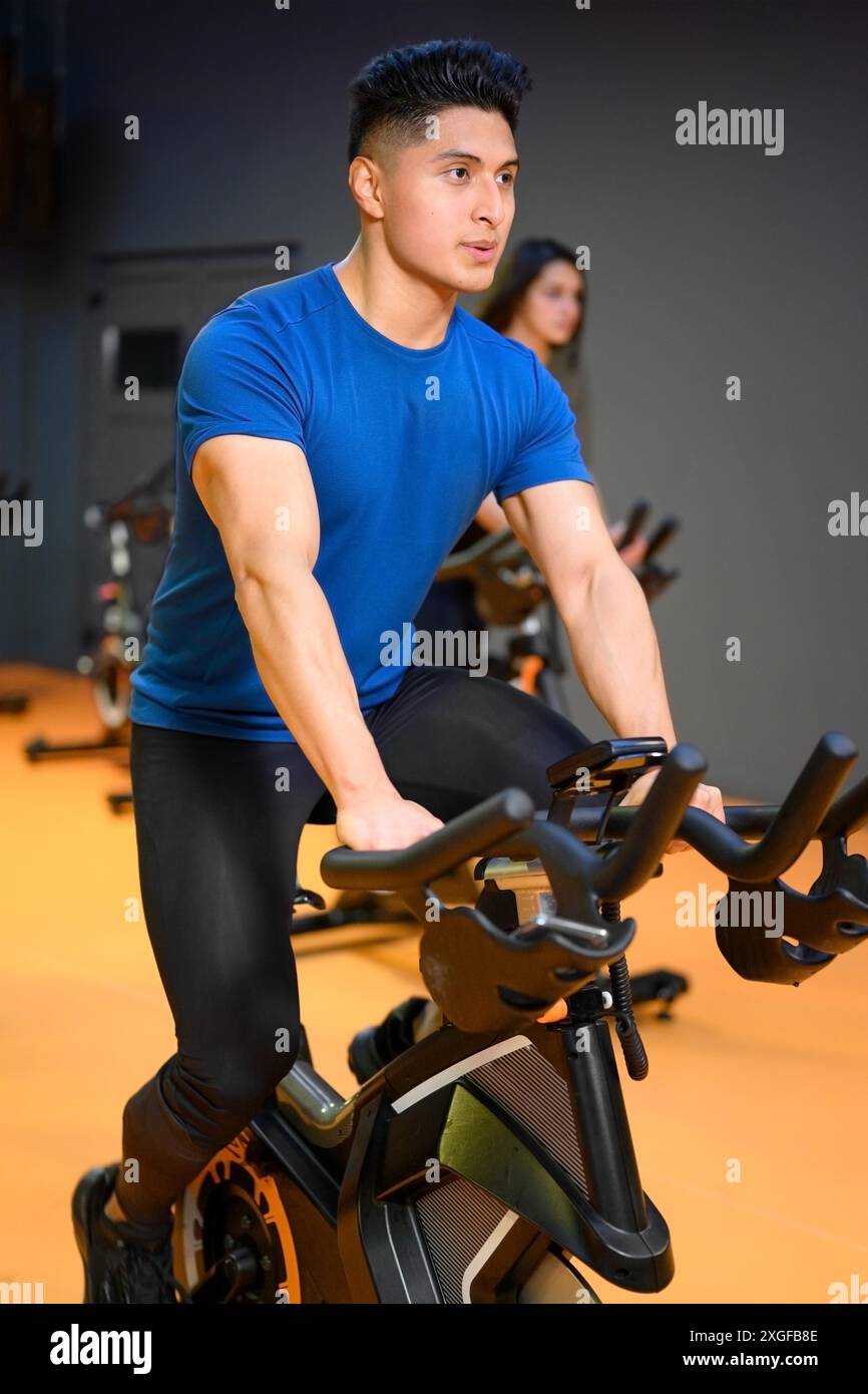 People cycling at gym. High quality photo Stock Photo - Alamy