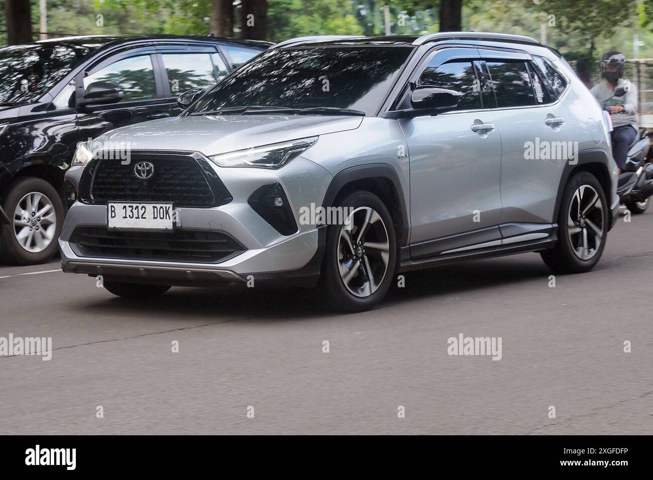 Silver SUV Toyota Raze in a road, at business and commercial distric TB ...