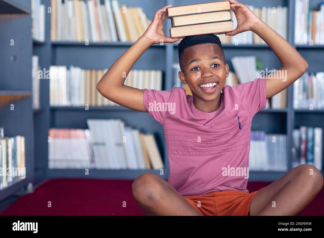 Little schoolboy reading book in hi-res stock photography and images ...