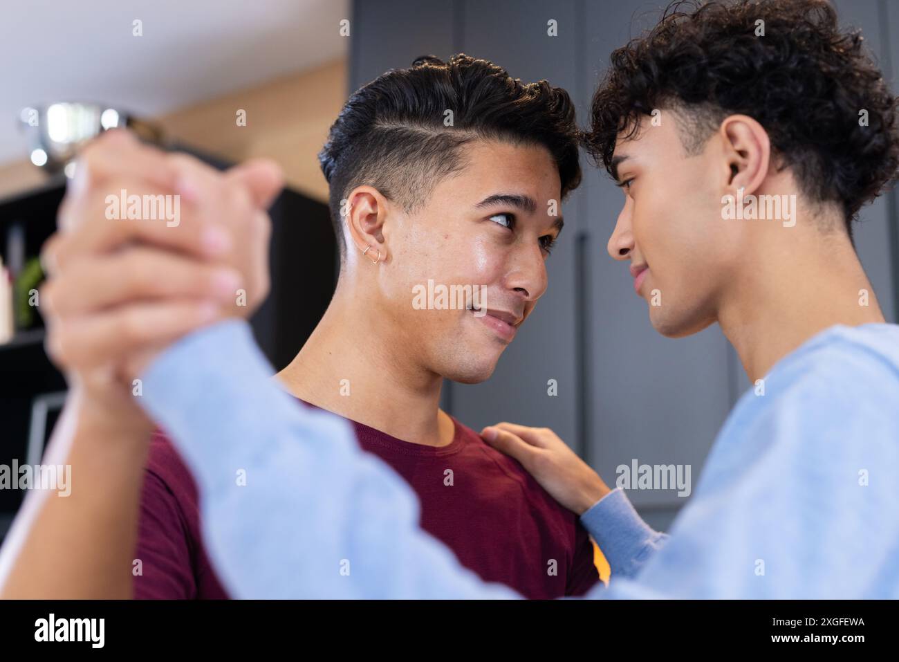 Dancing together, male gay couple sharing intimate moment at home Stock ...