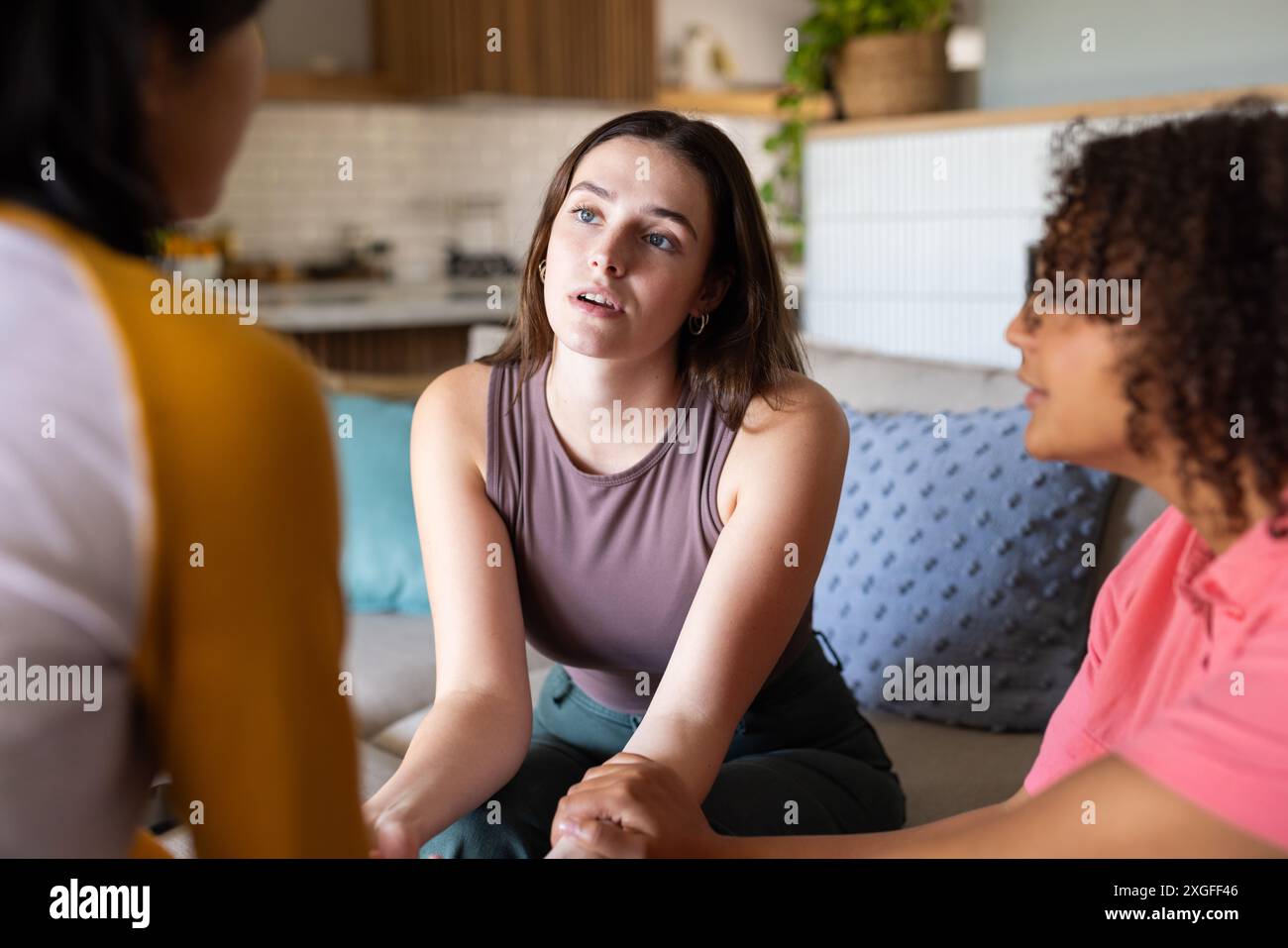 Talking and supporting each other, three women friends having ...