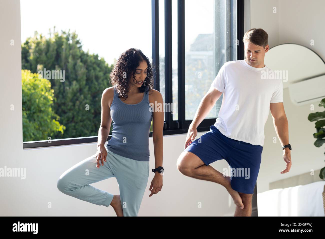 Young couple practice stretching together hi-res stock photography and ...