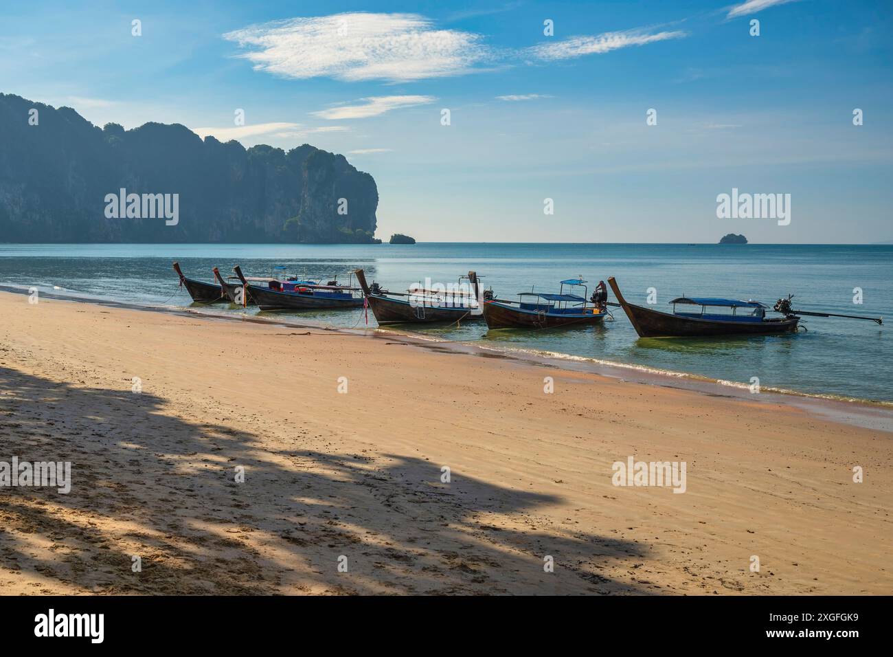 Tropical islands view with long tail boat ocean blue sea water and ...