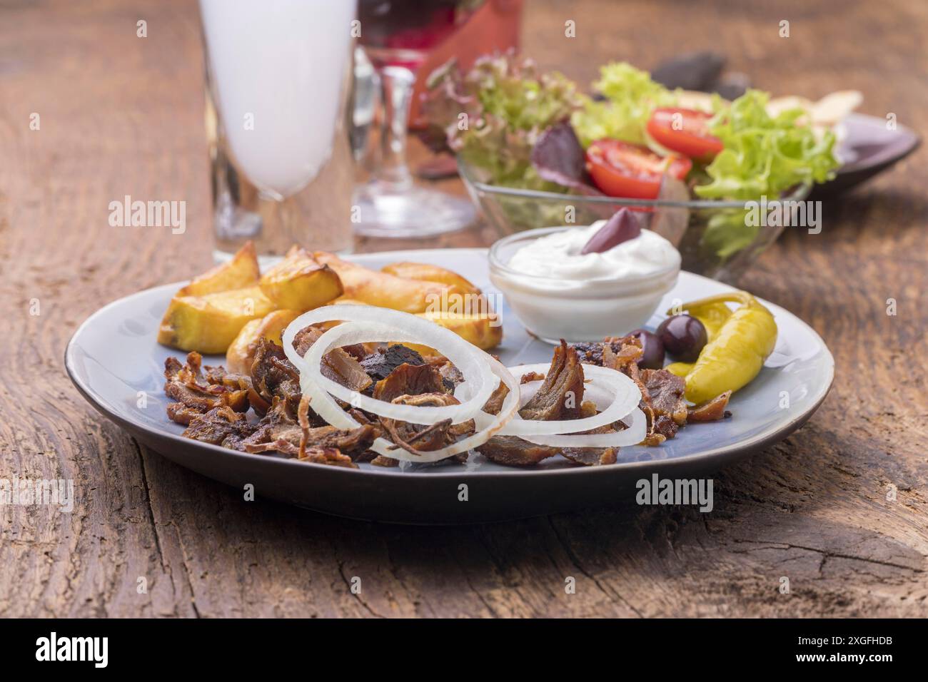 Greek gyros on a plate Stock Photo - Alamy