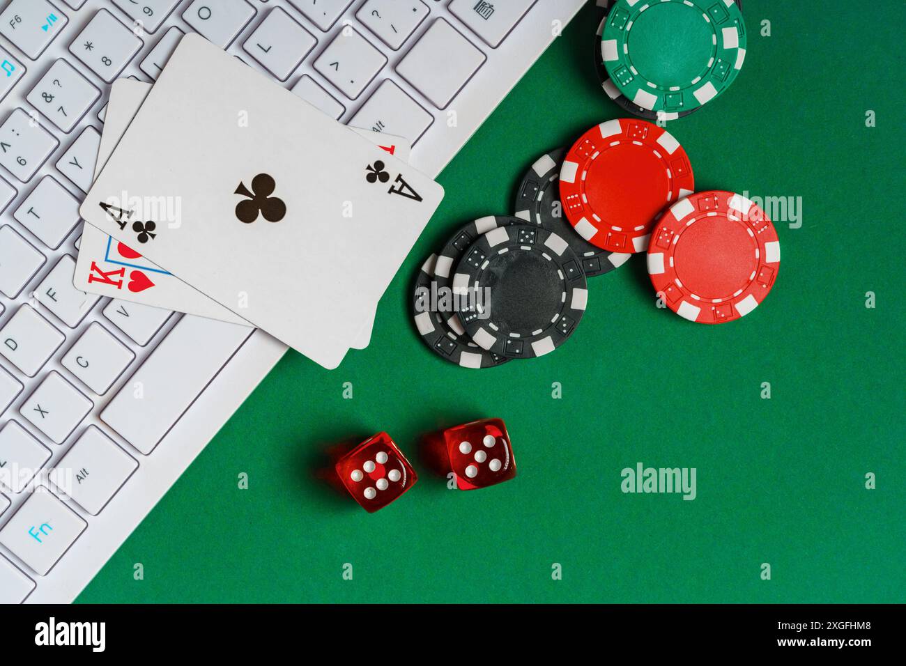 Playing Cards, Dice, and Chips on Green Felt Gaming Table With Keyboard ...