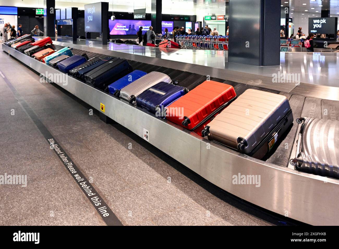 Airport baggage claim carousel baggage Stock Photo - Alamy
