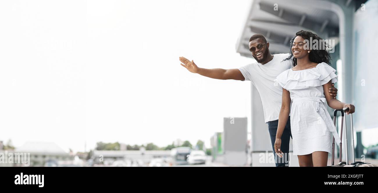 Happy Couple Waving Goodbye at Airport Terminal Stock Photo - Alamy