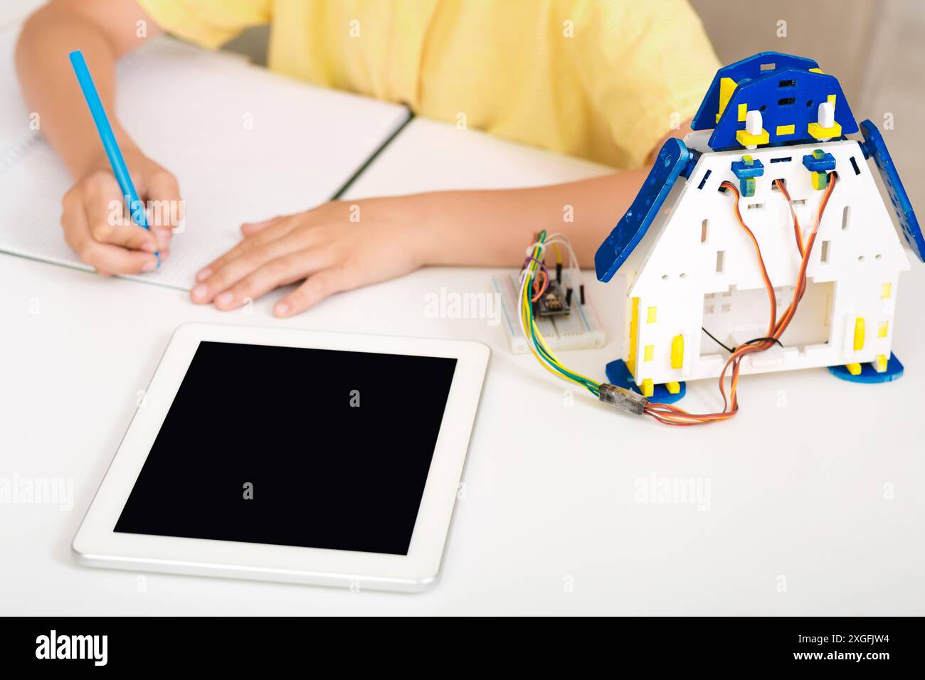 Child Learning Robotics And Coding With Tablet And Robot Kit Stock ...