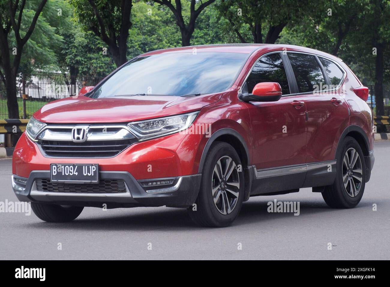 Red Color SUV Honda CR-V, driving in TB Simatupang street, Jakarta ...