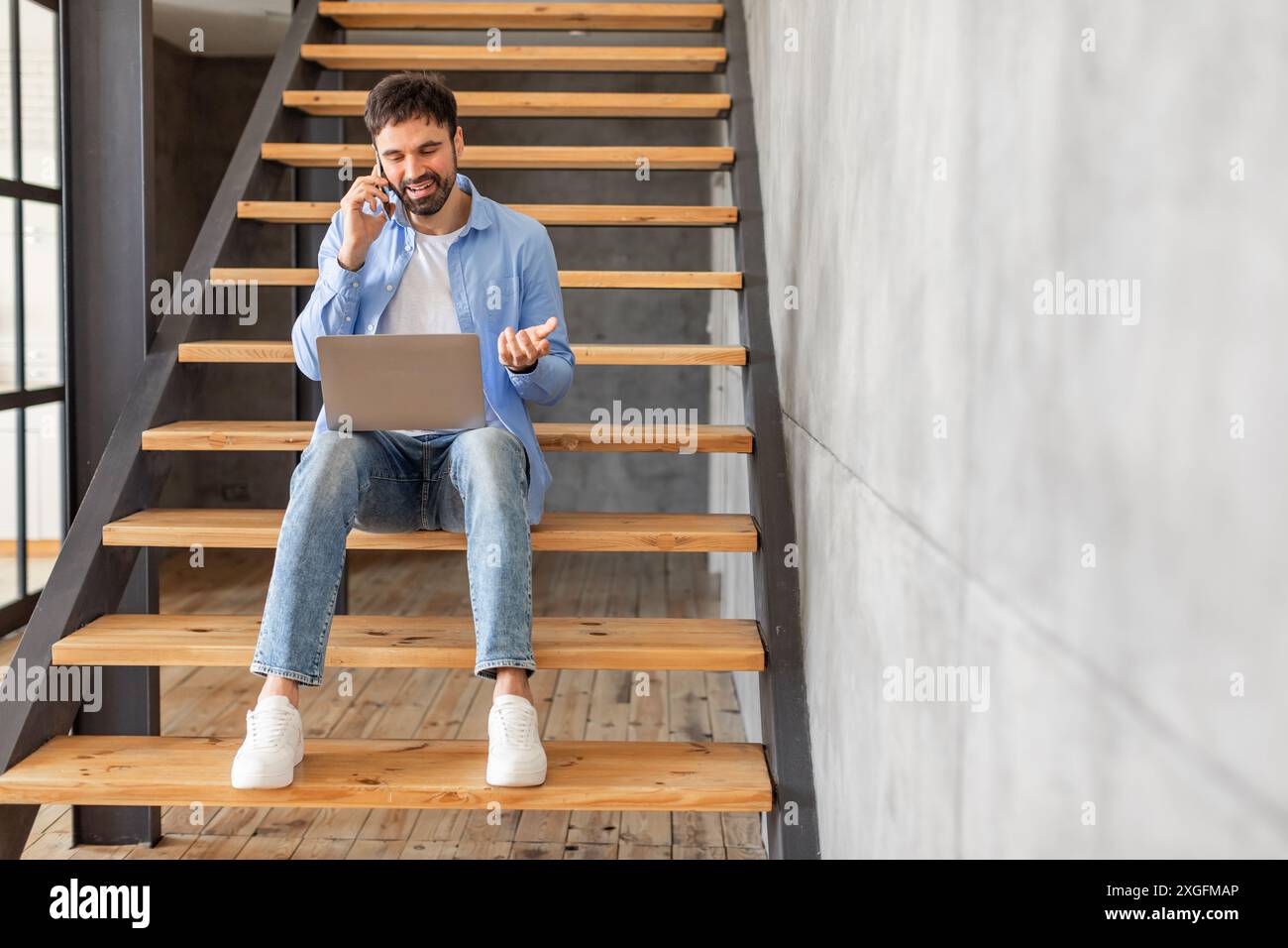 Businessman sitting on stairs hi-res stock photography and images - Alamy