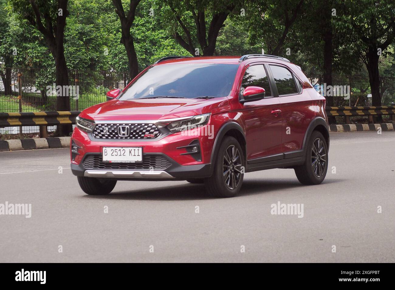 Red Color SUV car, Honda WR-V, driving in TB Simatupang street, Jakarta ...