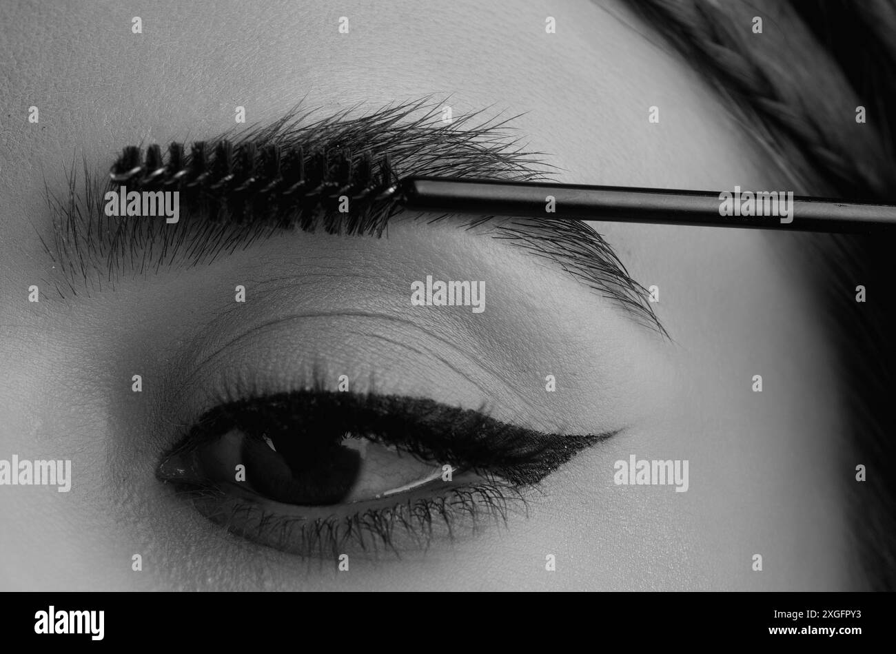 Closeup eyebrows with eyebrow brush. Close up brows, eyebrows lamination. Brow procedures. Long ...