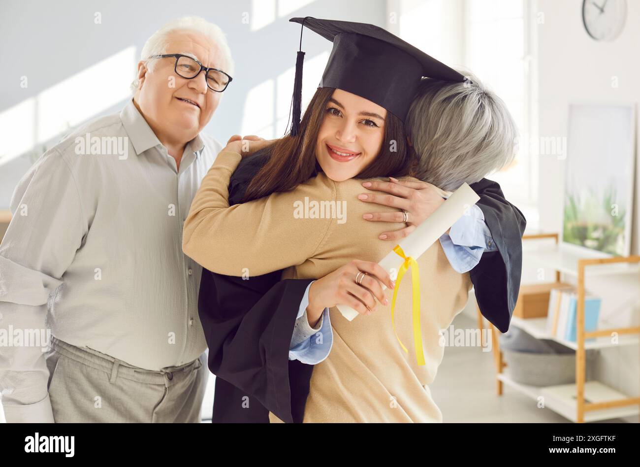 Parents daughter university graduation hi-res stock photography and ...