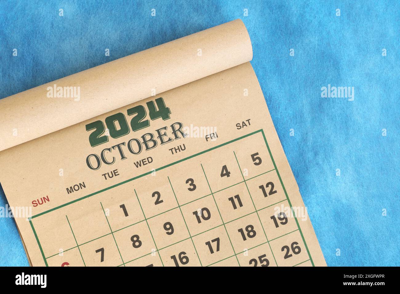 October 2024 calendar flat lay in blue background with copy space Stock ...