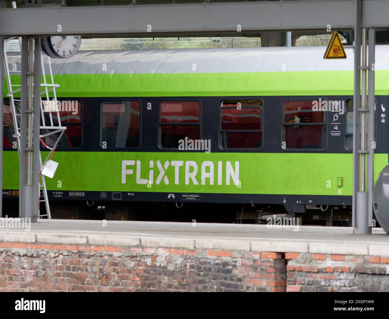 Hagen, Germany - April 7, 2024. Flixtrain arrives at a station ...