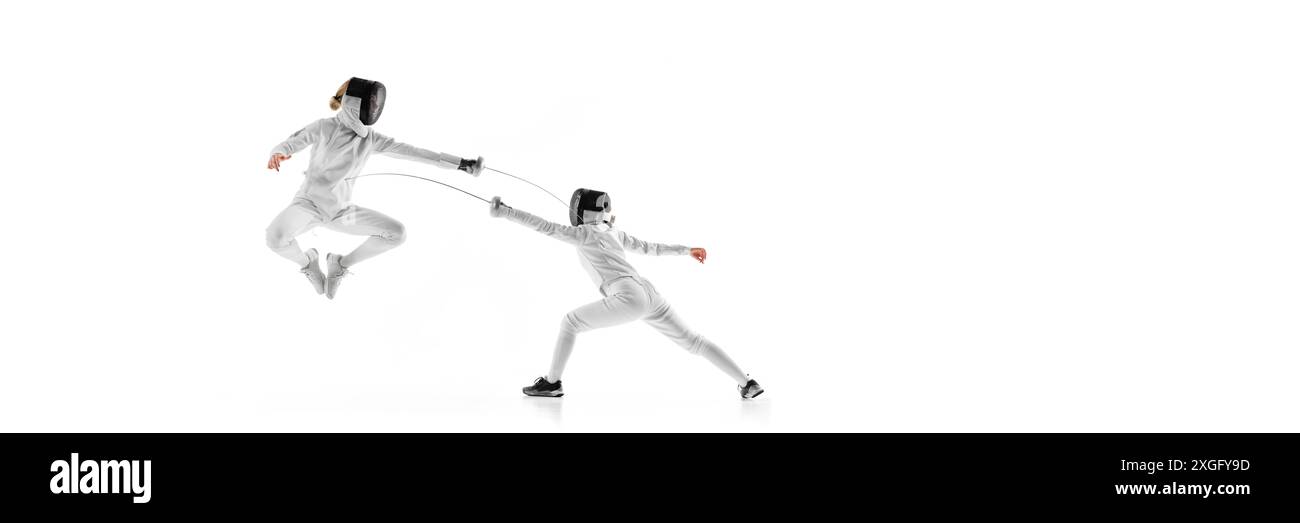 Banner. Two female fencers practice their techniques against white ...