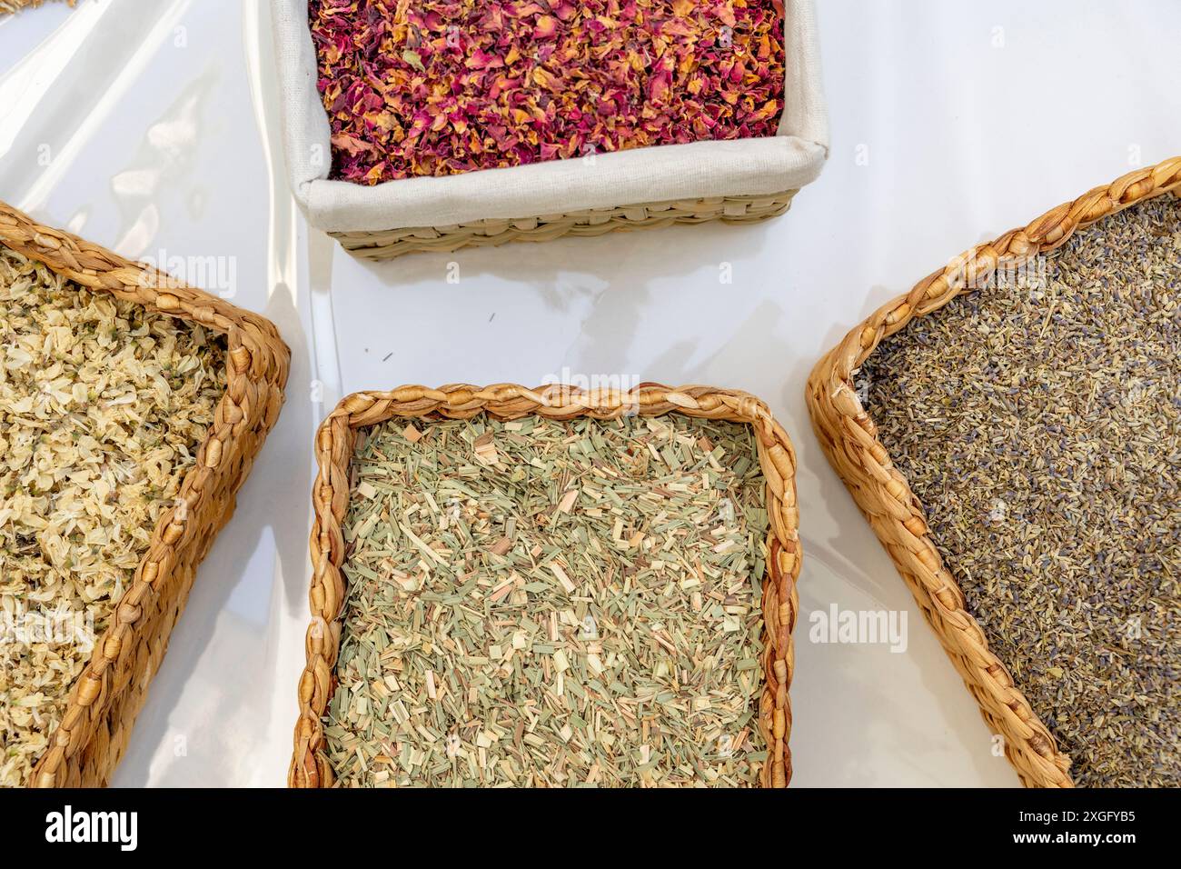 boxes with different types of tea leaves herbal and floral on white ...