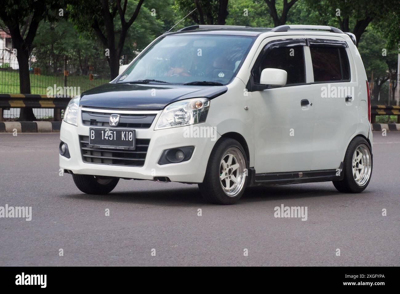 Small and compact city car, Suzuki Karimun Wagon R, drive at TB ...