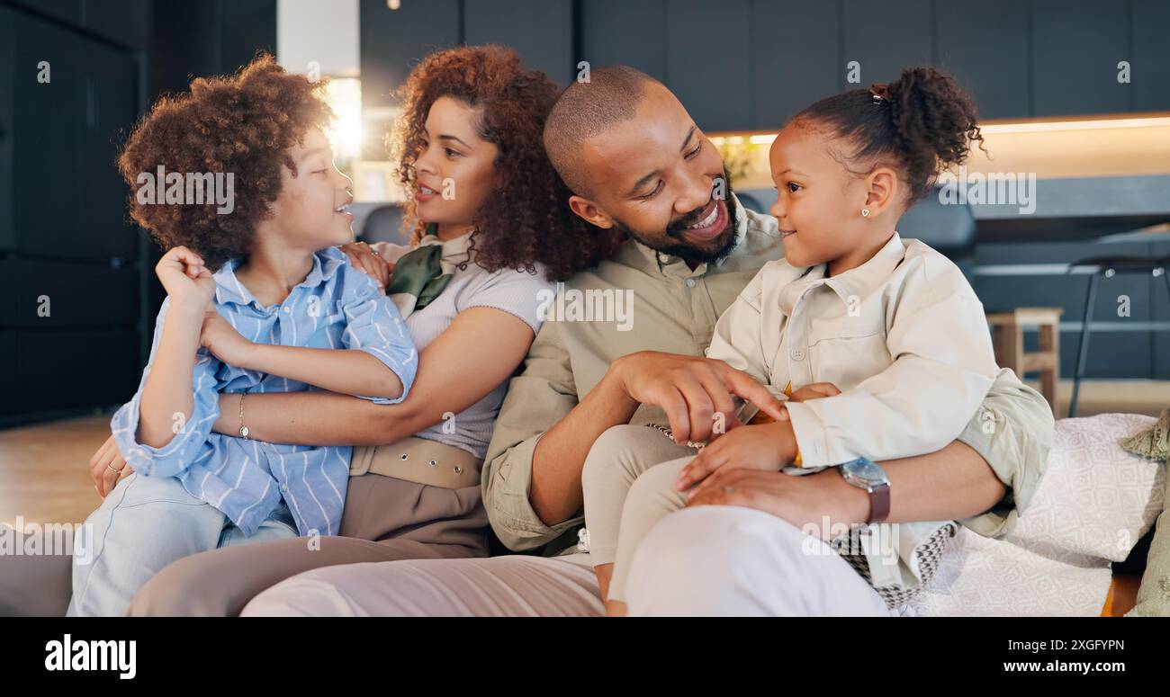 Family, children and hug in home on sofa, parents and love for unity ...