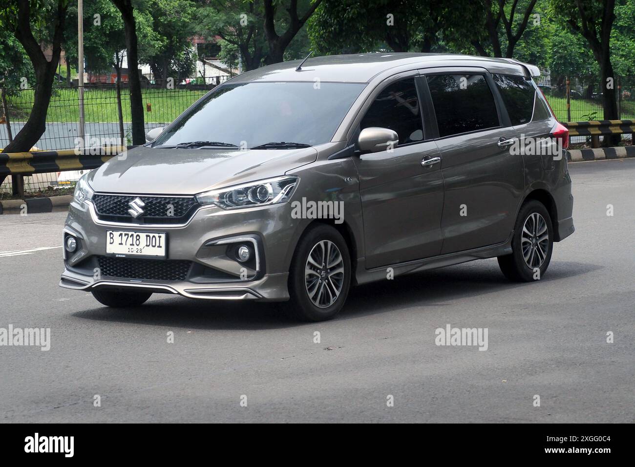 MPV vehicle, Suzuki Ertiga car driving at TB Simatupang street, Jakarta ...
