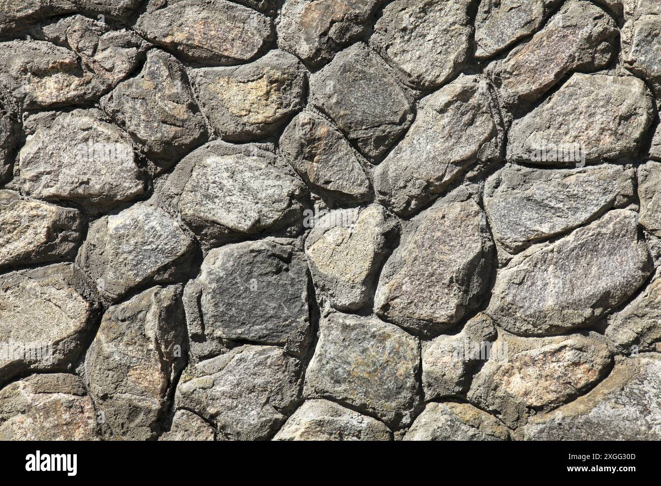 Granite wall, background. Surface of stone structure built of granite ...
