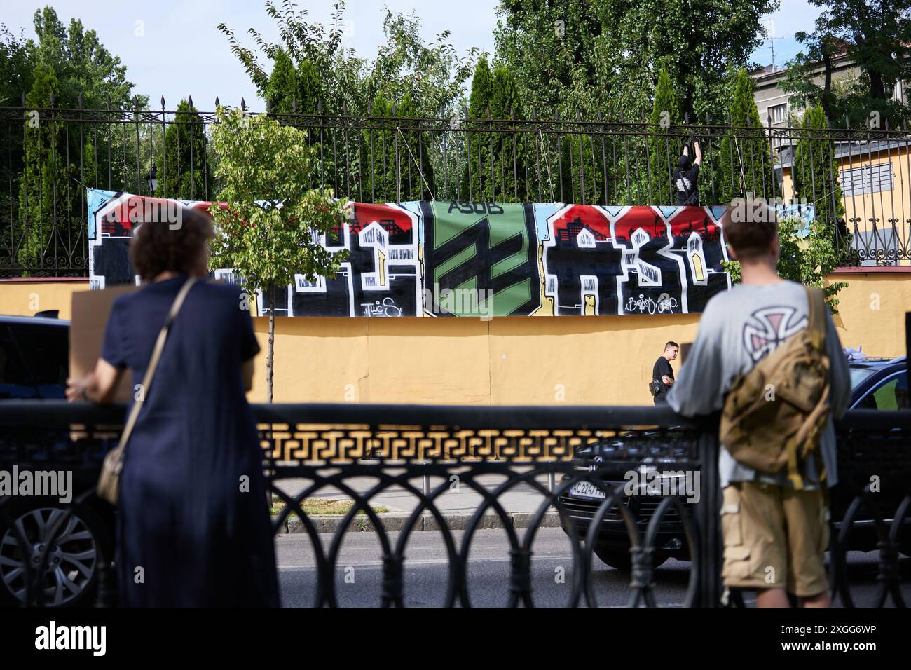 Banner "Free Azov" and logo of 12th NGU brigade "Azov" at a public ...