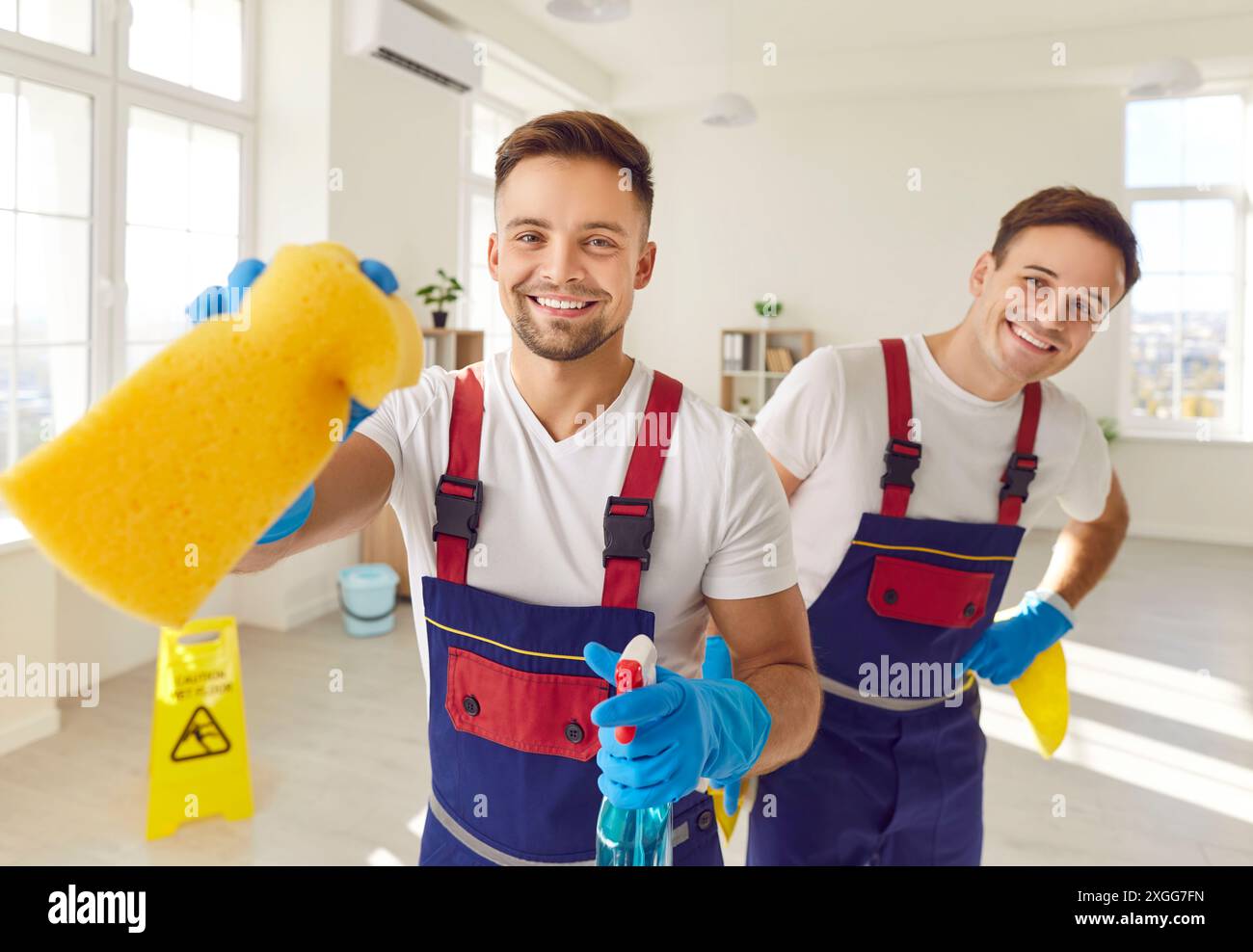 Portrait happy janitors cleaning hi-res stock photography and images ...