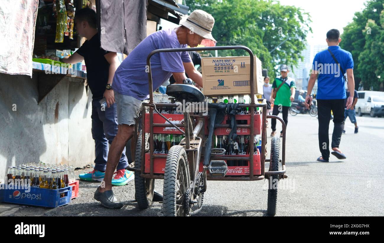 Loading his bicycle hi-res stock photography and images - Alamy