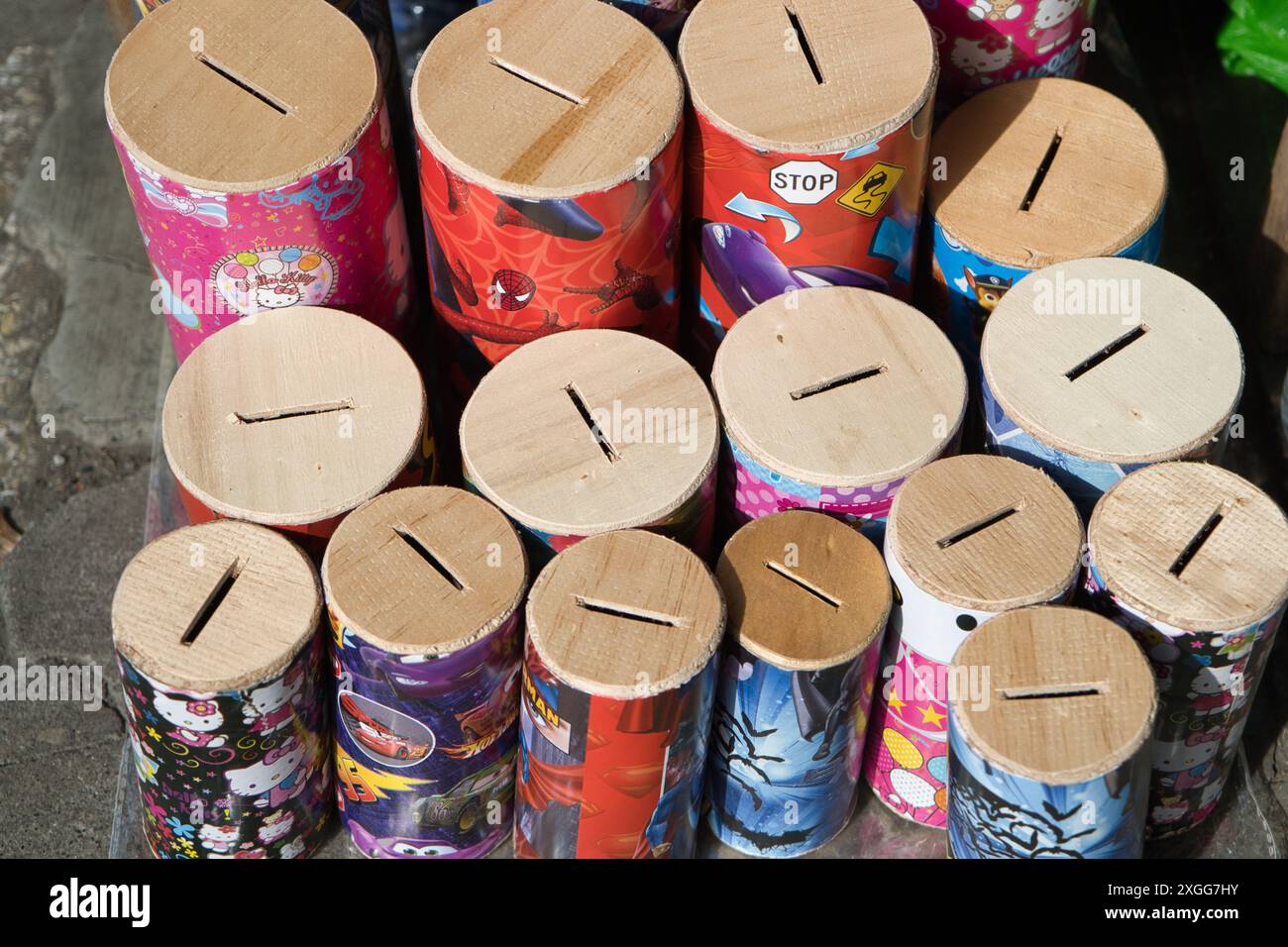 A collection of wooden containers with various designs, including one ...