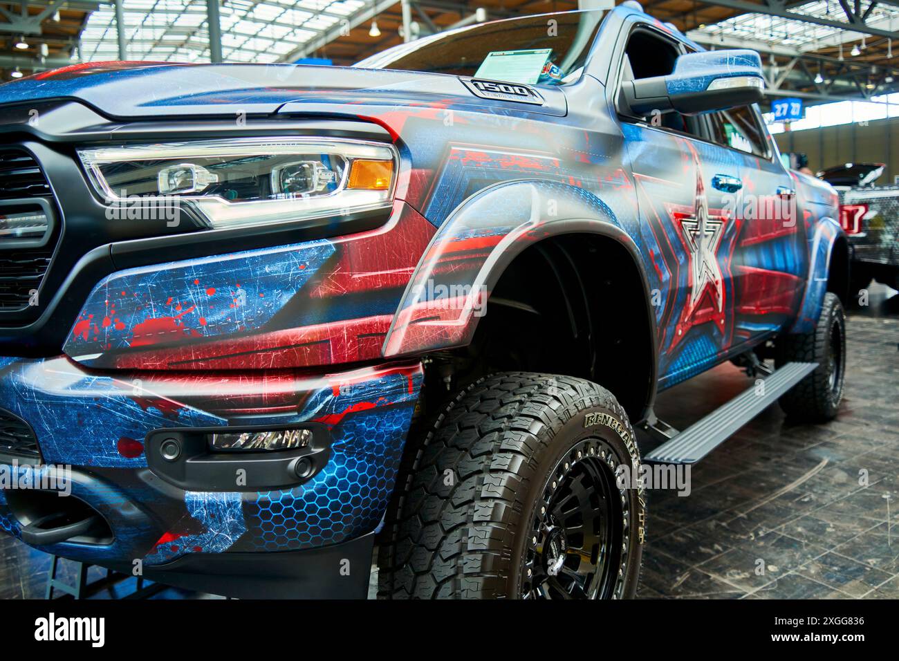 Dodge Ram with striking blue and red paint in front side view in ...